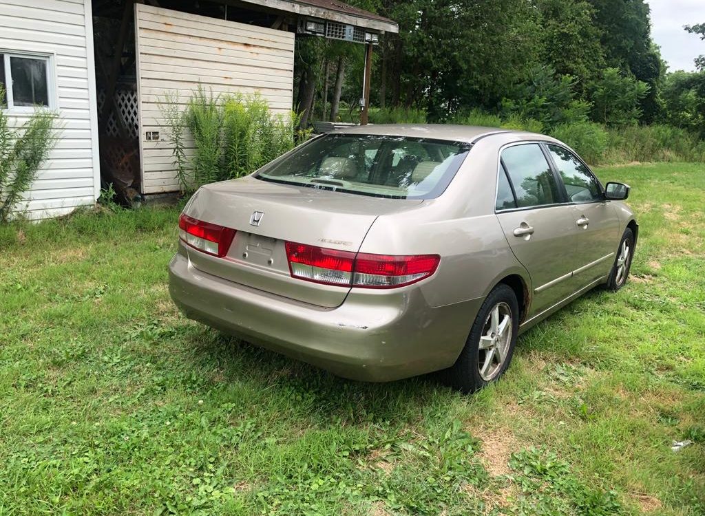 2003 Honda Accord. Mileage is 232,829. – Intact Auto Sales